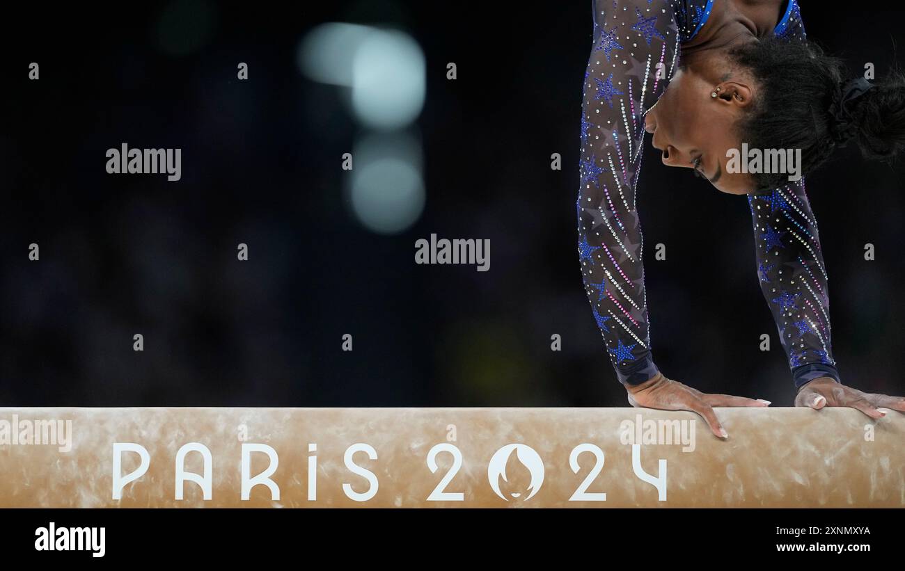 Simone Biles, of the United States, performs on the balance beam during ...