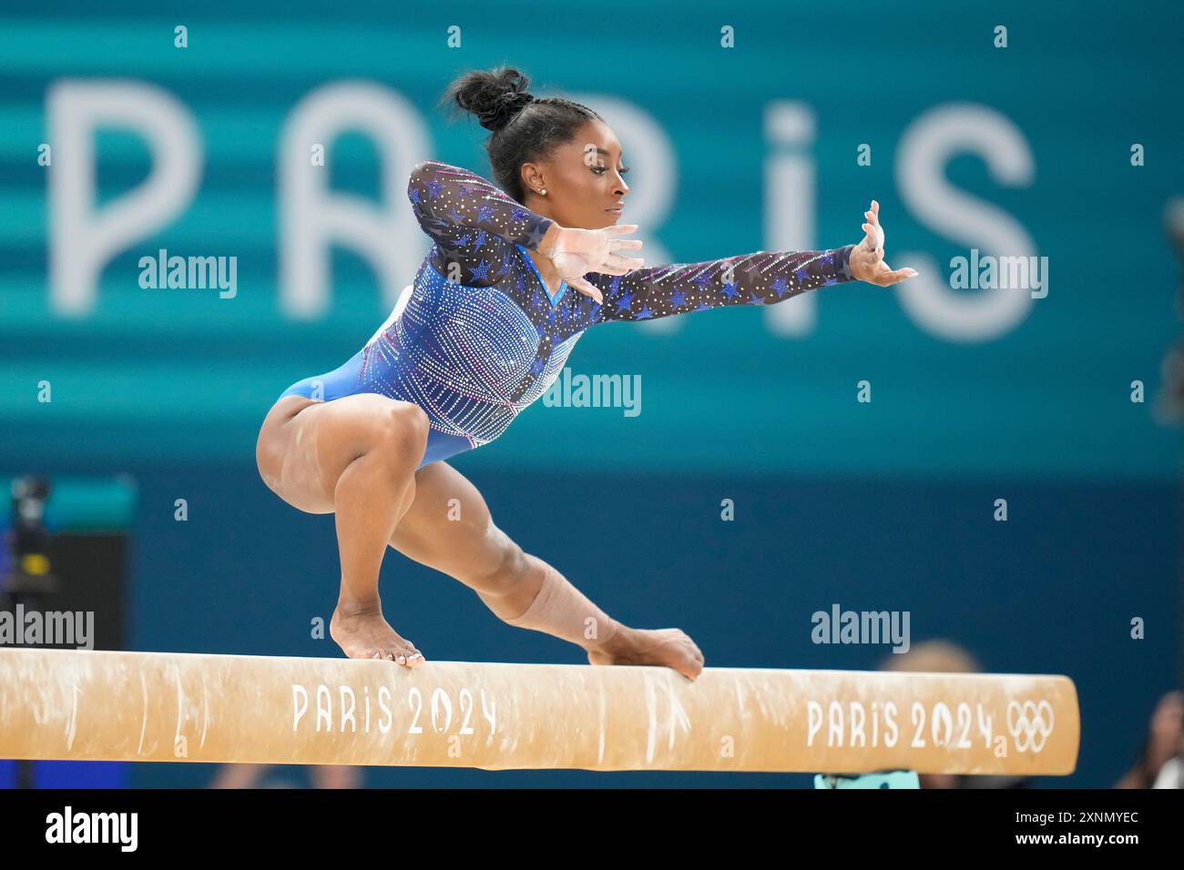 Simone Biles, of the United States, performs on the balance beam during ...