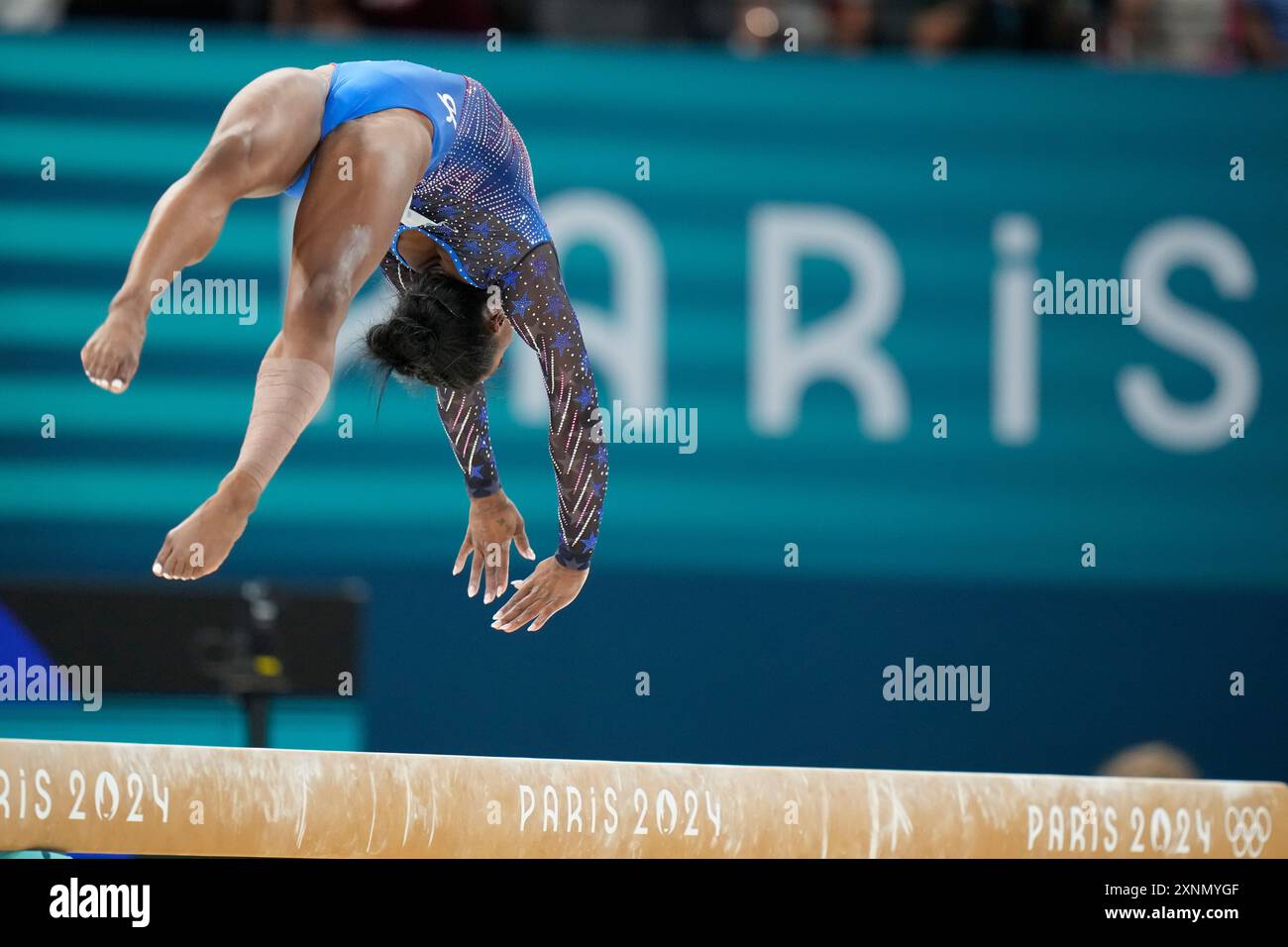 Simone Biles, of the United States, performs on the balance beam during ...