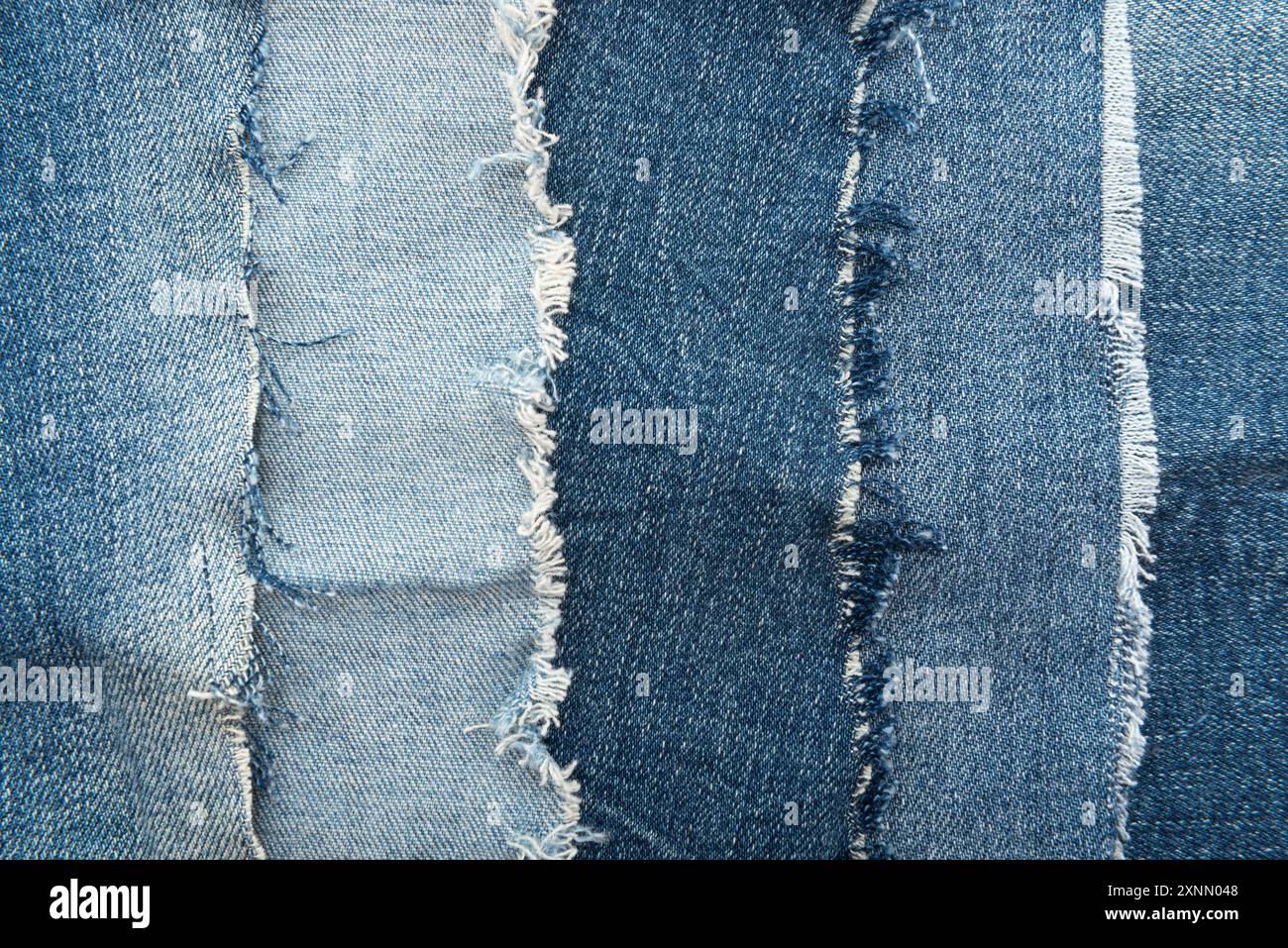 Texture of denim pieces. Background of jeans Stock Photo - Alamy