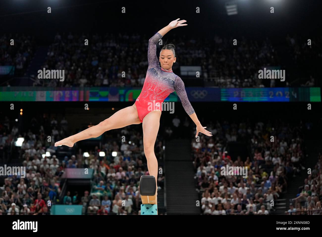 Suni Lee, of the United States, performs on the balance beam during the ...