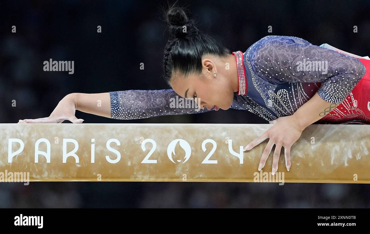 Suni Lee, of the United States, performs on the balance beam during the ...