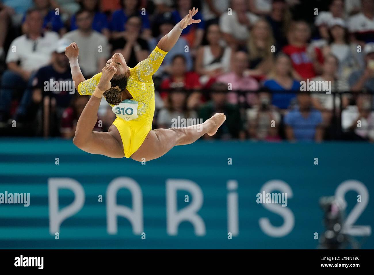 Rebeca Andrade, of Brazil, performs on the balance beam during the ...