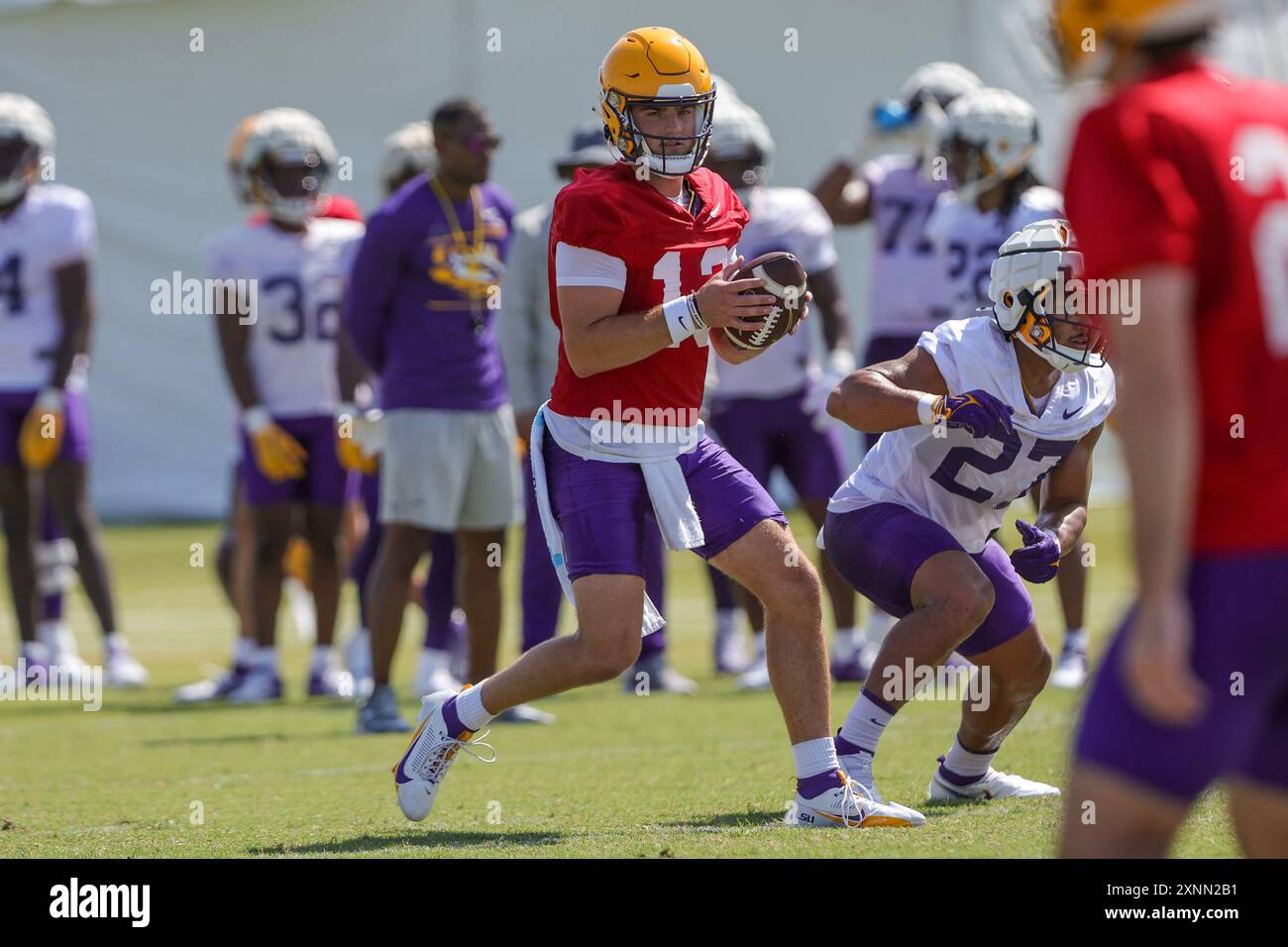 August 1, 2024: LSU quarterback Garrett Nussmeier (13) looks for an ...
