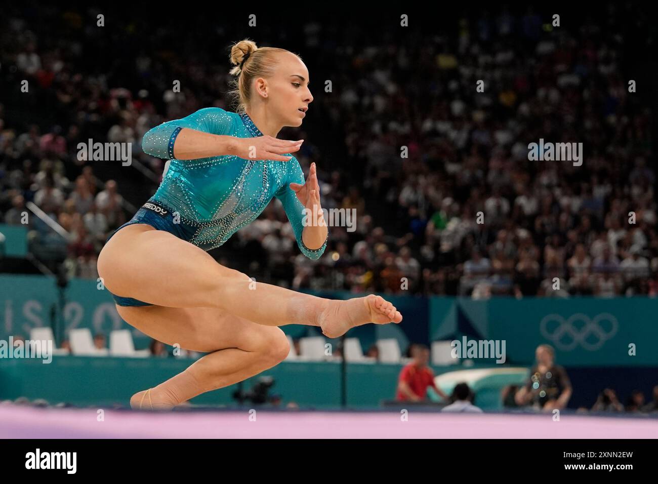 Alice D'Amato, of Italy, performs on the floor during the women's ...