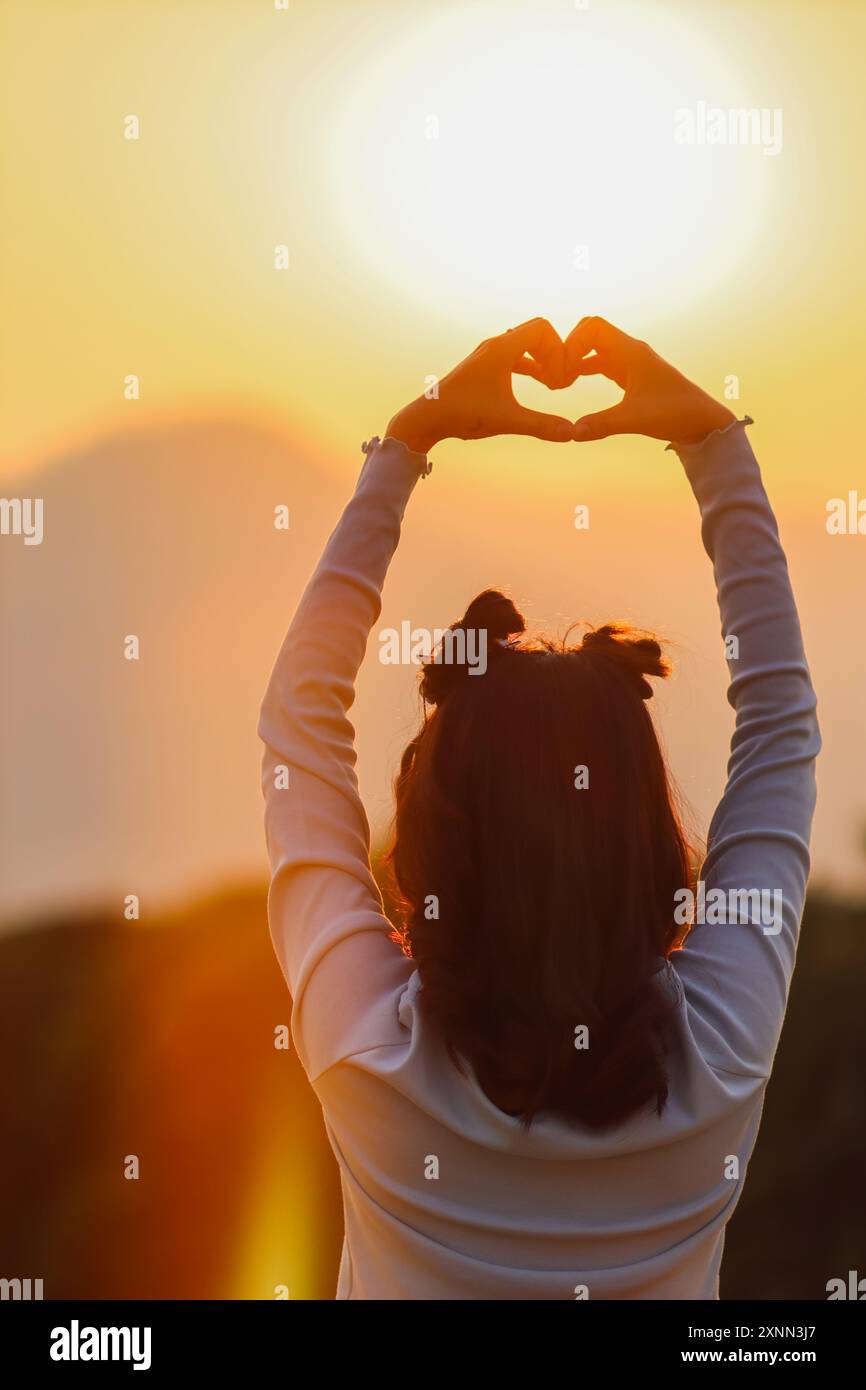 The hand-painted girl's silhouette is a heart-shaped symbol of love ...