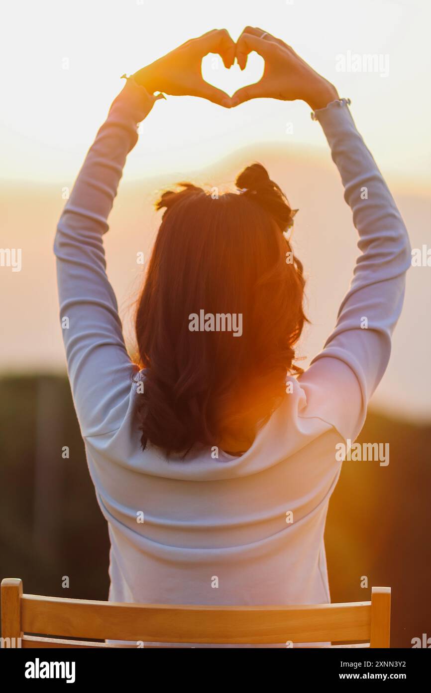 The hand-painted girl's silhouette is a heart-shaped symbol of love ...
