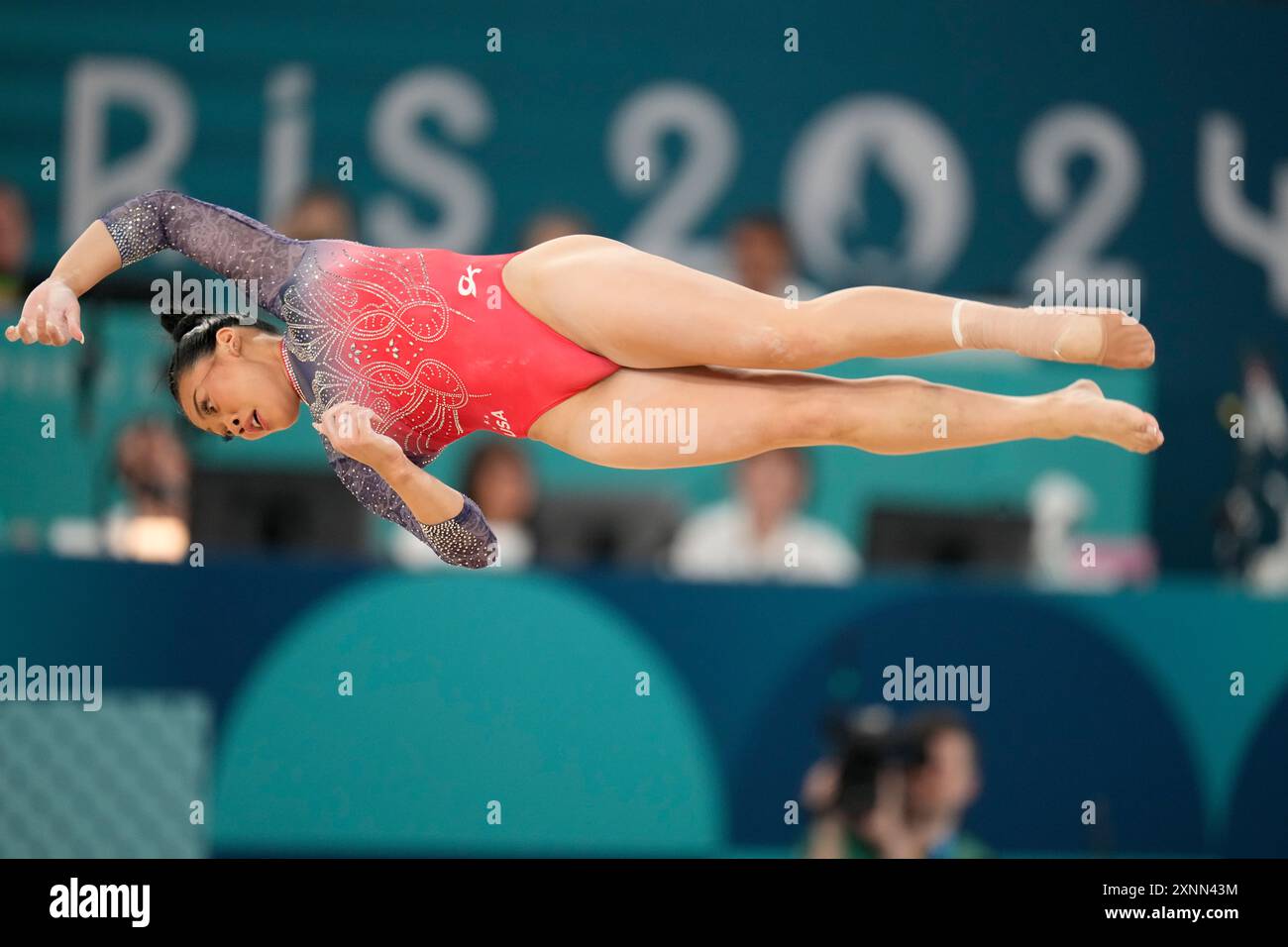 Suni Lee, of the United States, performs on the floor during the women ...