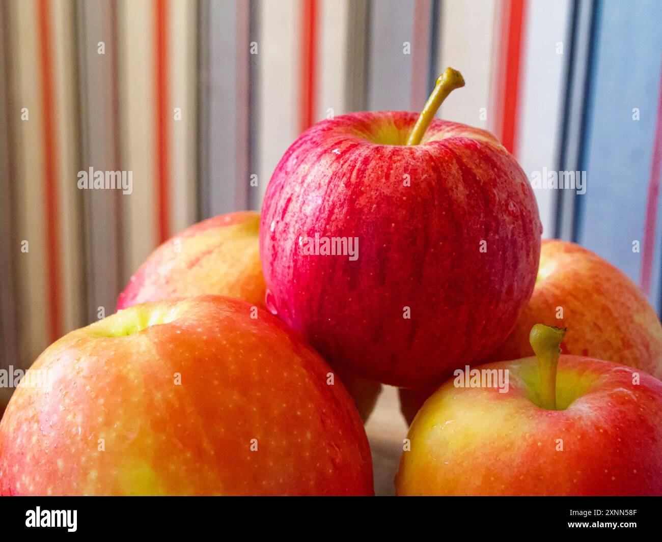 Crisp Apple Freshness. Bright red apples with dew, suggesting freshness ...