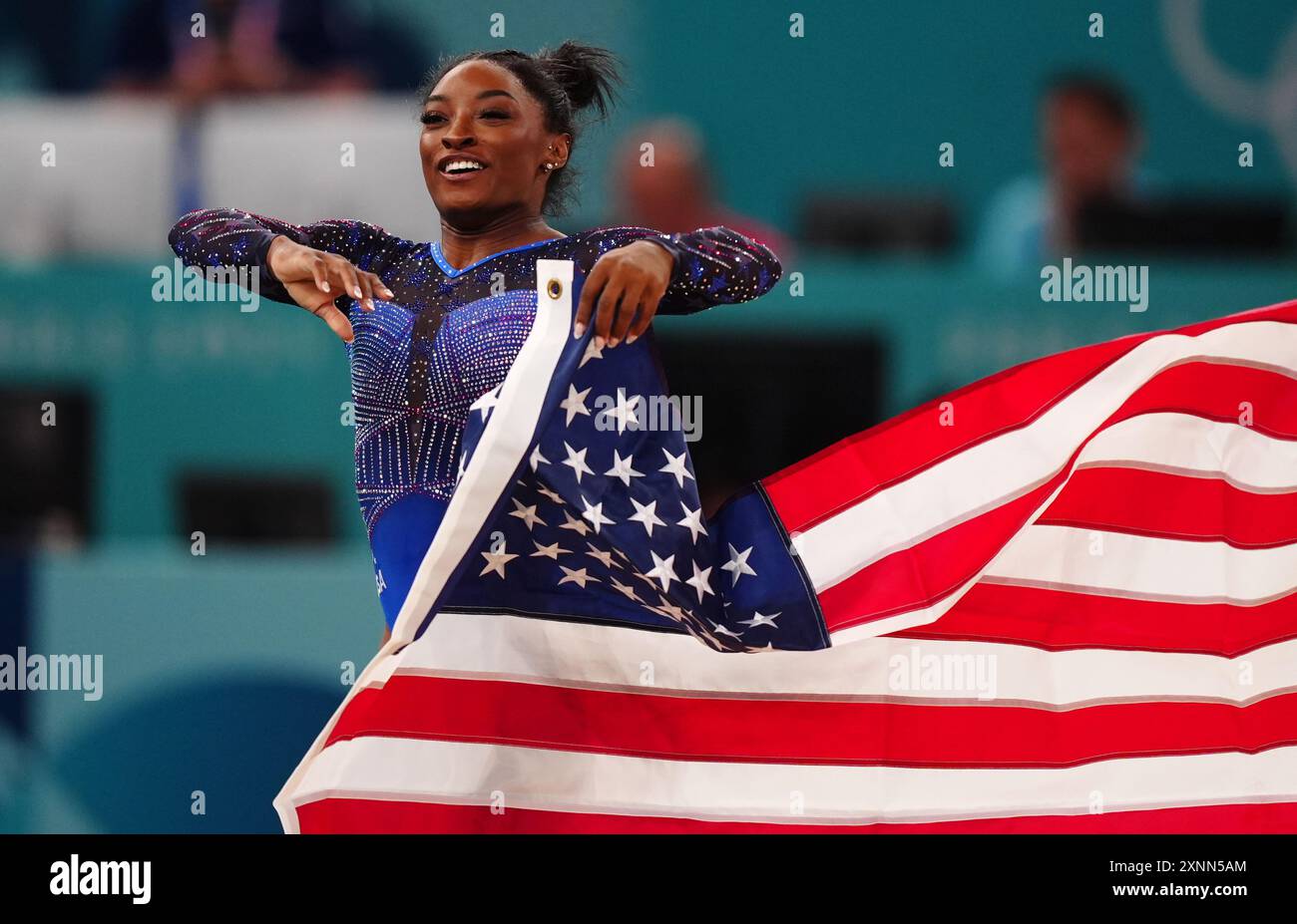 USA's Simone Biles celebrates winning the gold medal following the ...