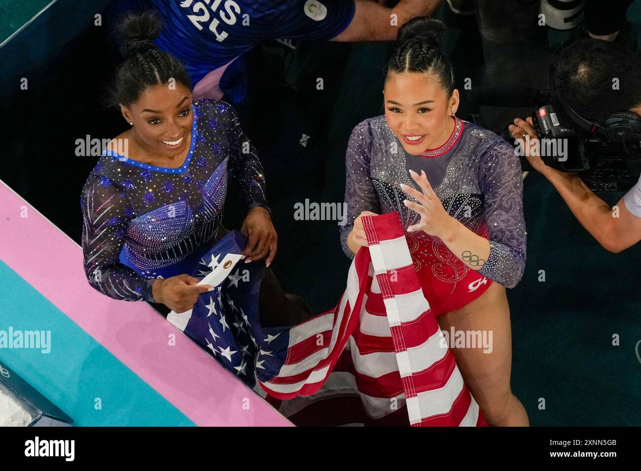 Simone Biles, of the United States, and Suni Lee, of the United States ...
