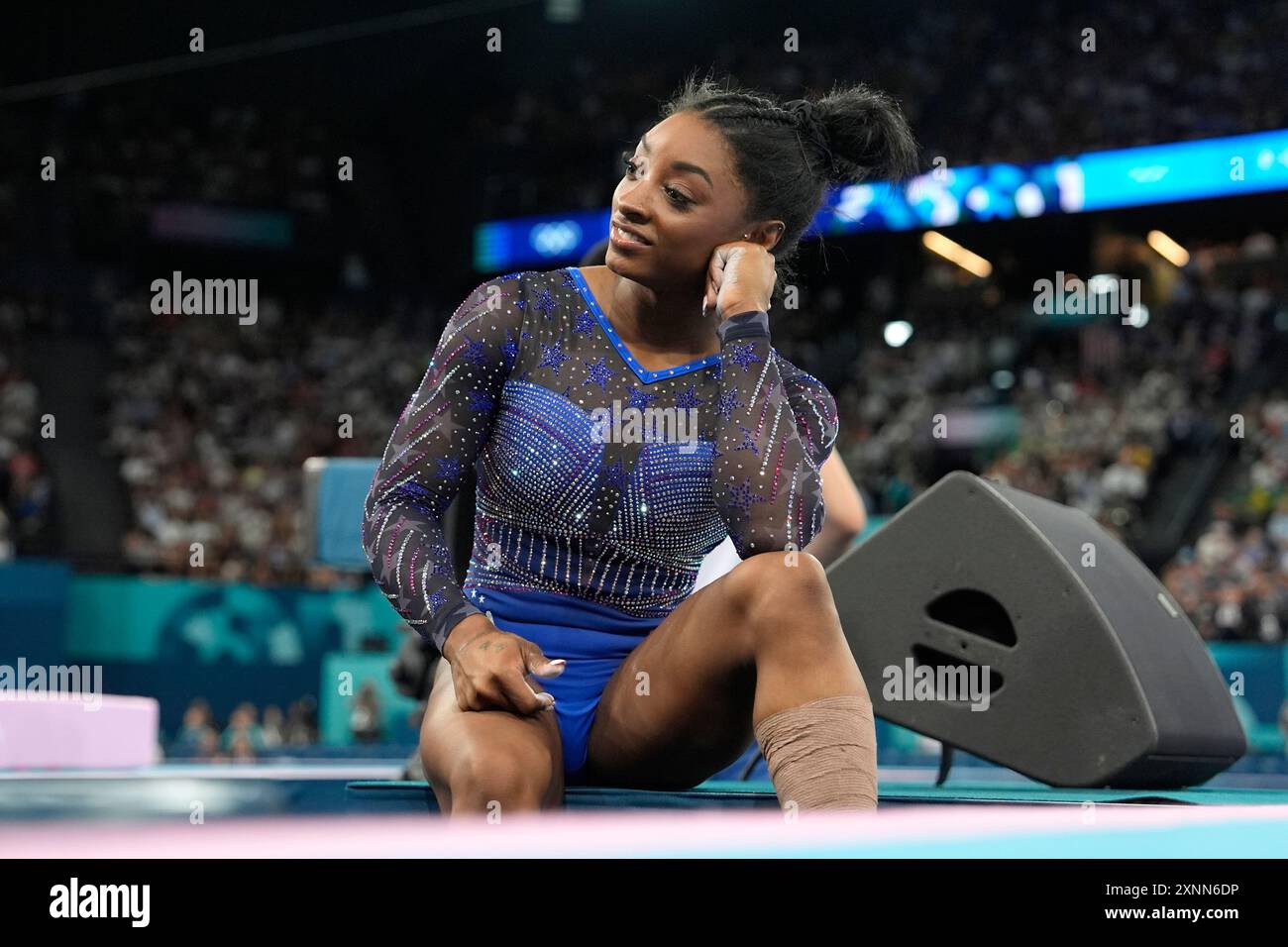 Simone Biles, of the United States, waits for her scores after ...