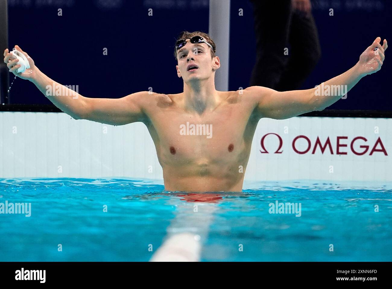 Hubert Kos, of Hungary, celebrates after winning the men's 200-meter ...