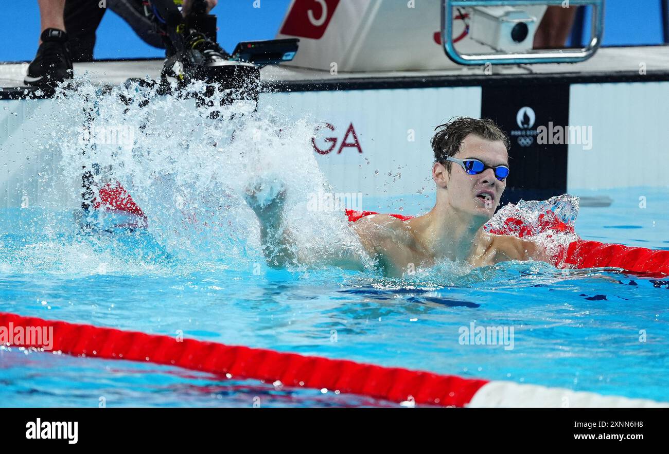 Hungary’s Hubert Kos celebrates after winning in the men’s 200m ...