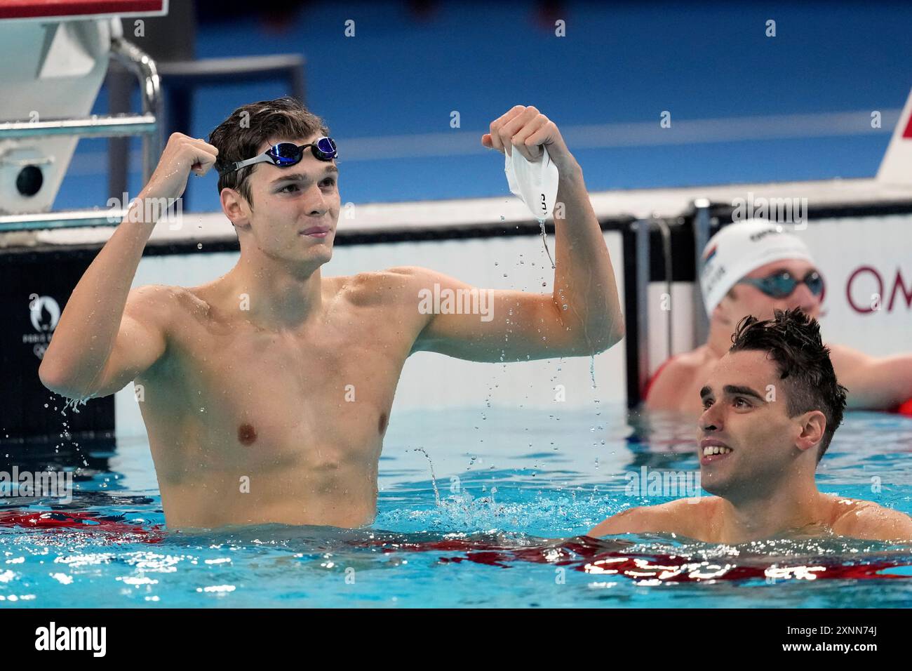 Hubert Kos, of Hungary, celebrates winning the men's 200-meter ...