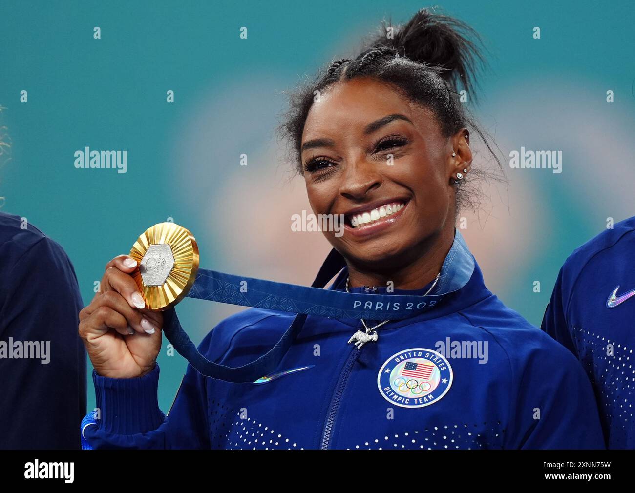 USA's Simone Biles with her gold medal, and sporting a silver goat ...