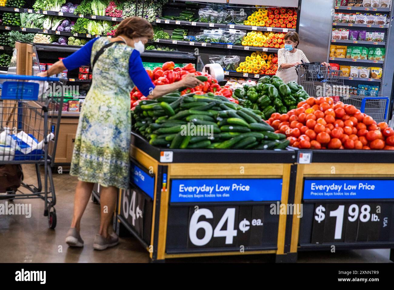 People buy groceries at a Walmart Superstore in Secaucus, New Jersey ...