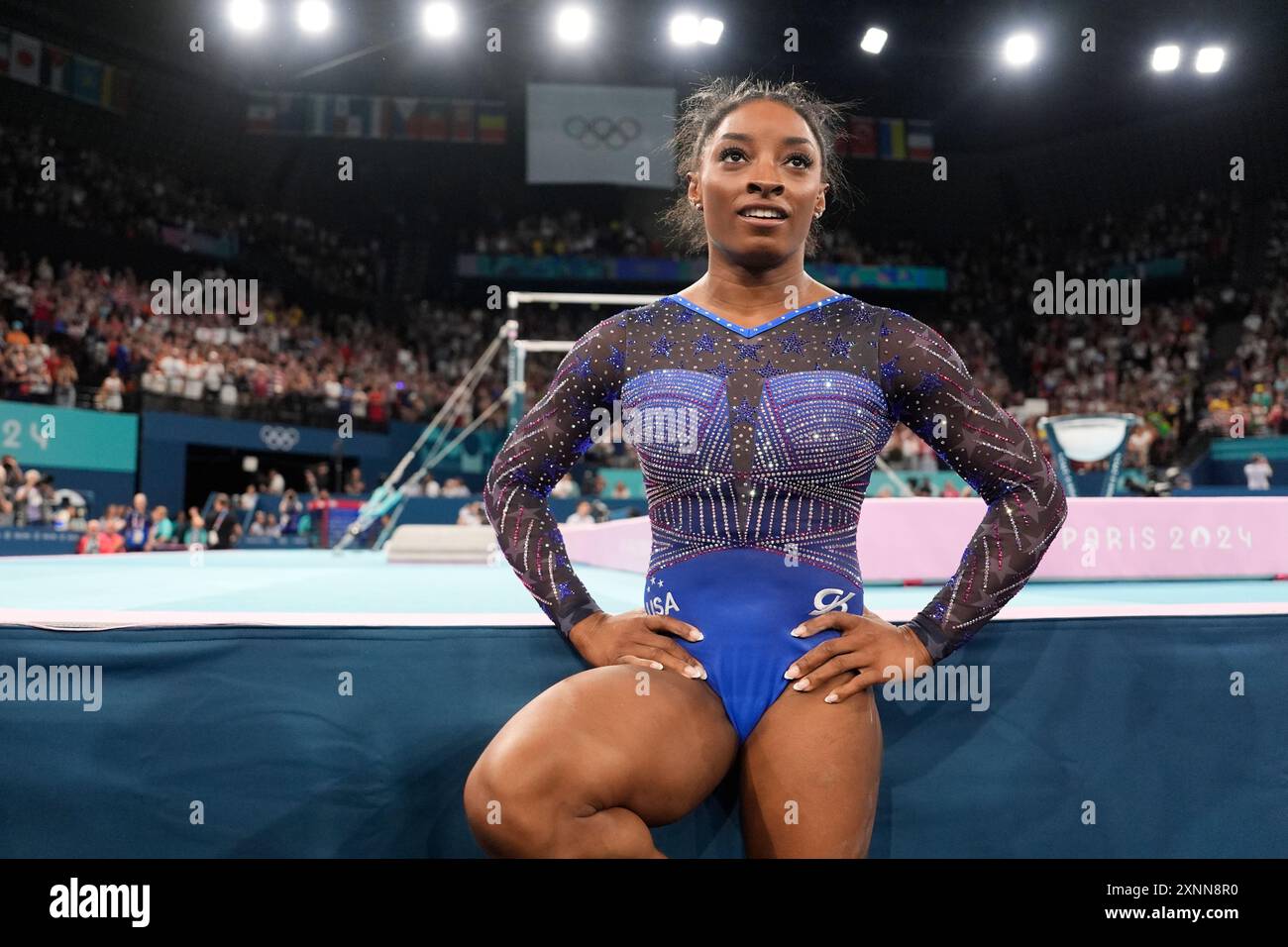 Simone Biles, of the United States, waits for her scores after ...