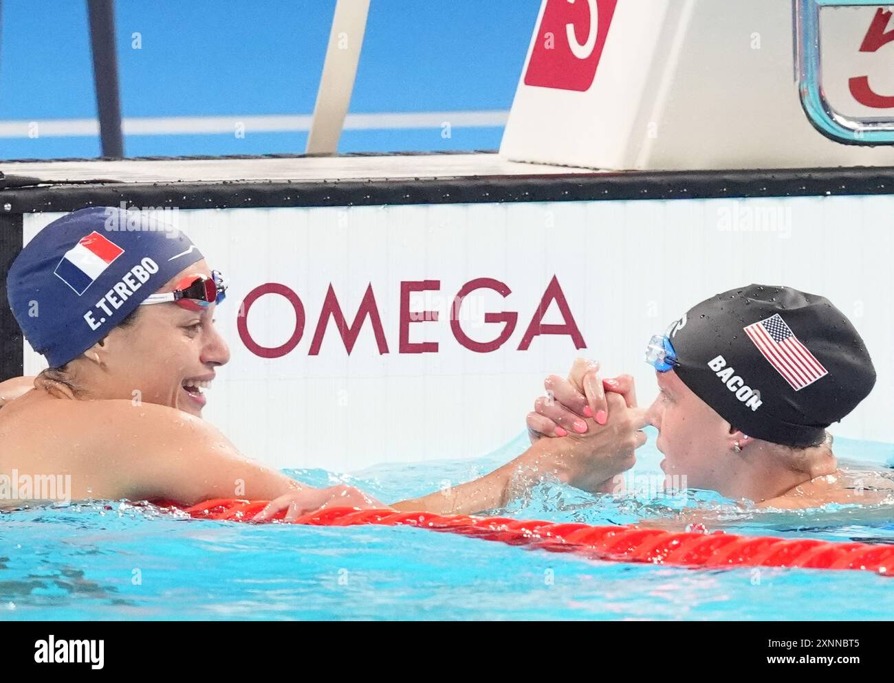 Phoebe Bacon of the U.S. is congratulated by Emma Terebo of France ...