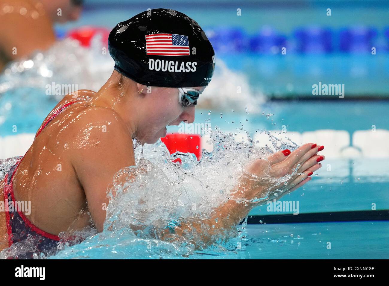 Kate Douglass, of the United States, competes in the women's 200-meter ...
