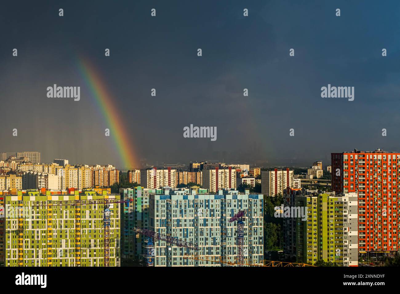 Big rainbow above city buildings hi-res stock photography and images ...