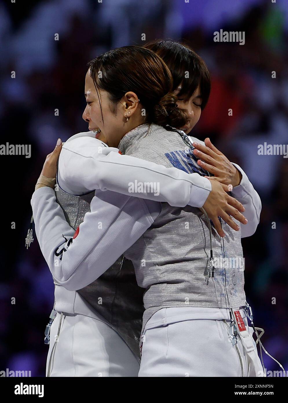 Paris, France. 1st Aug, 2024. Fencers of Japan celebrate after winning ...