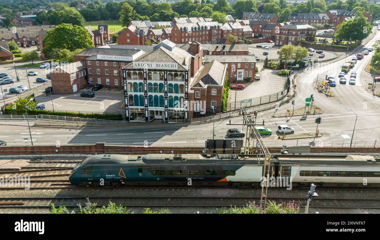 Aerial view Macclesfield Arighi Bianchi landmark store as a train works ...