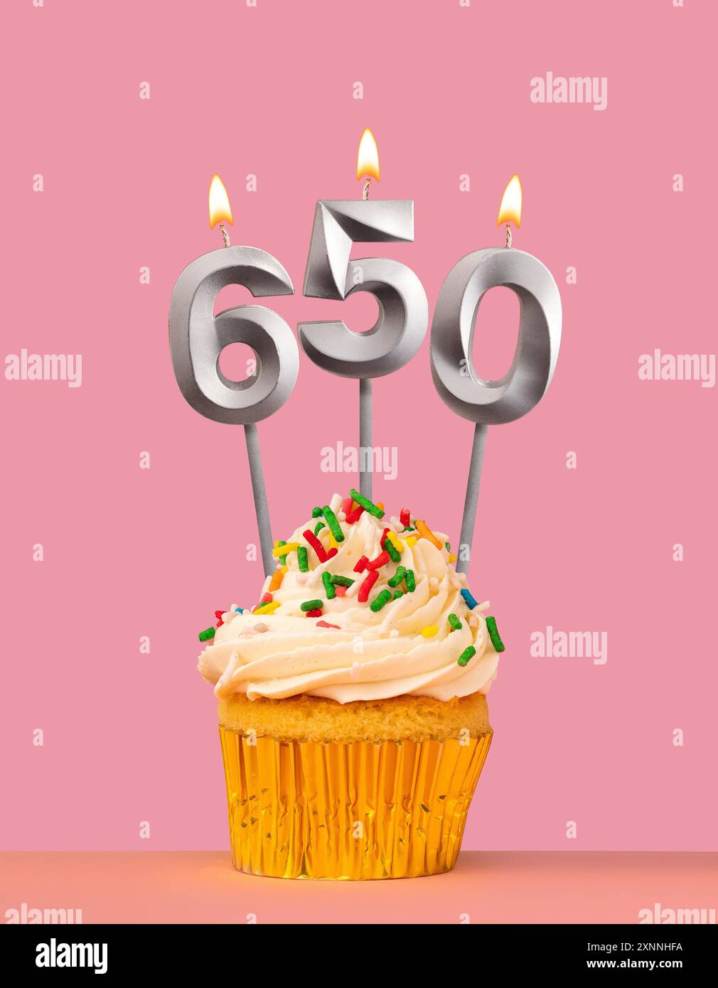Candle number 650 - Number of followers or likes Stock Photo - Alamy