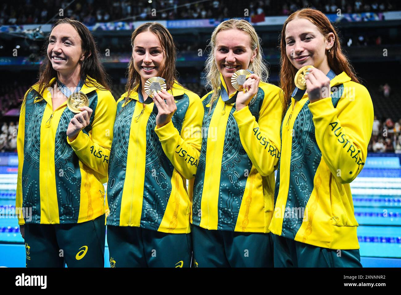 Team of Australia celebrate with his gold medal during the Swimming ...
