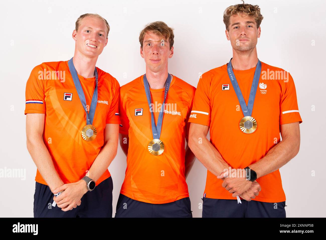 Netherlands' gold medalists in the men's quadruple sculls final rowing ...