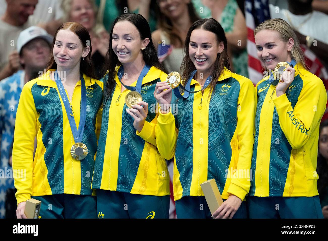 Australia's women's 4x200-meter freestyle relay team members celebrate with their gold medals on ...