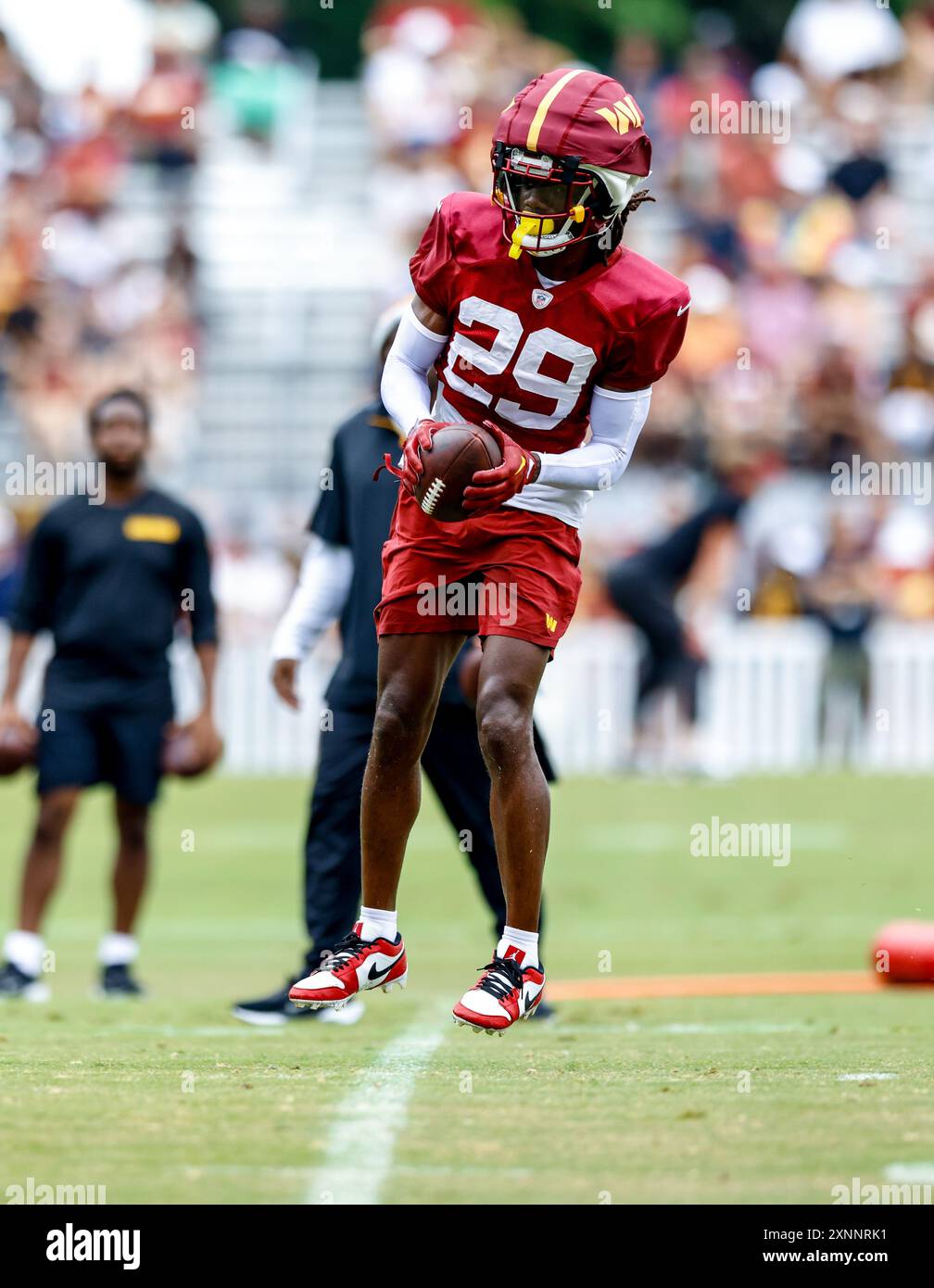 Washington Commanders cornerback James Pierre (29) makes a catch during ...