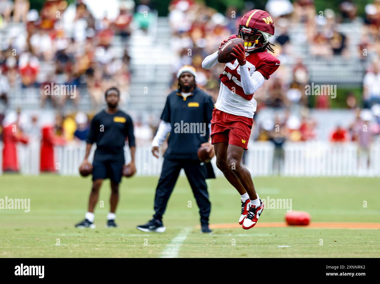 Washington Commanders cornerback James Pierre (29) makes a catch during ...