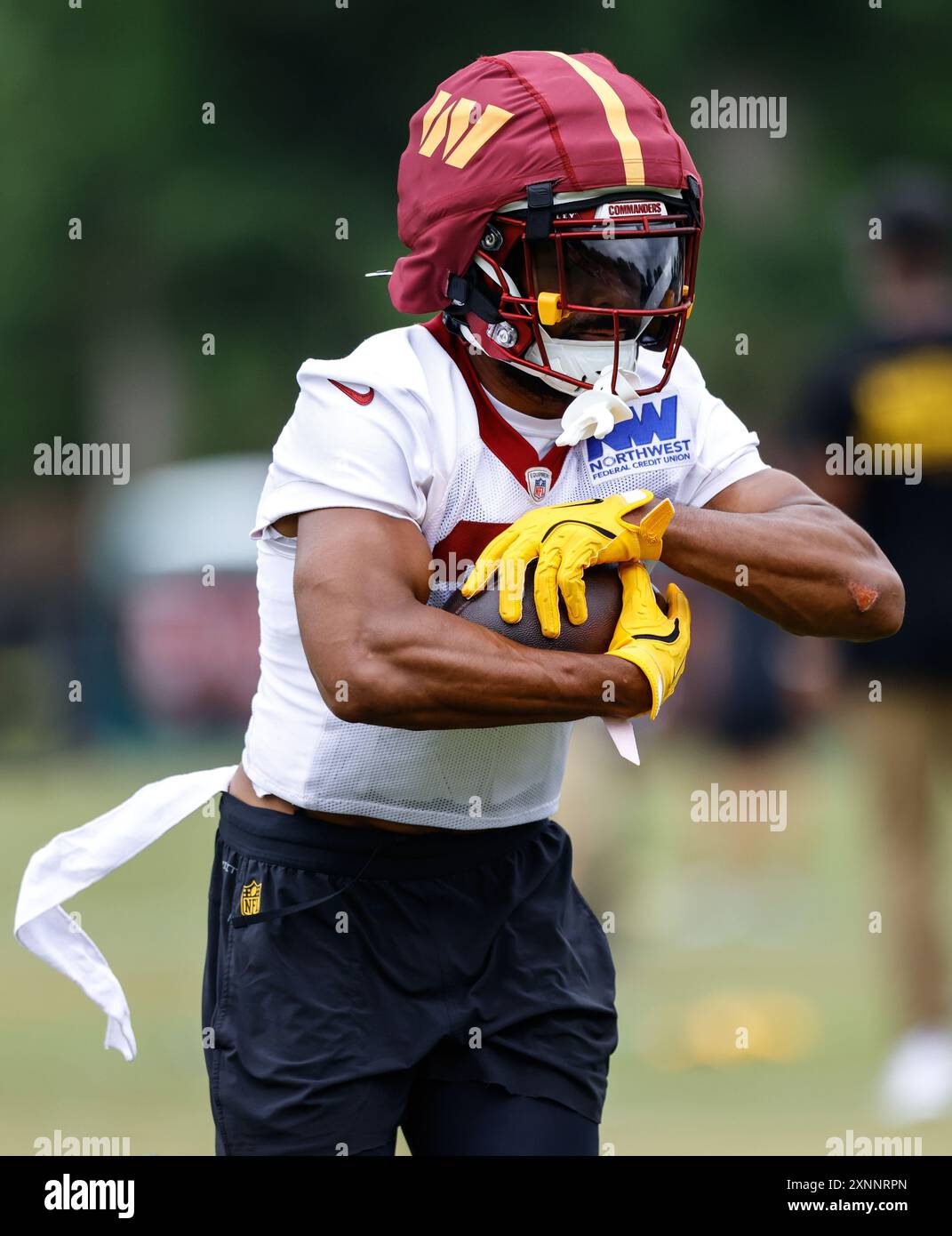 Washington Commanders running back Jeremy McNichols (31) running drills ...