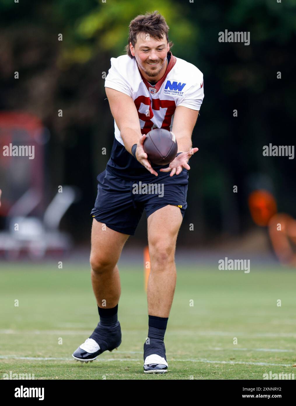 Washington Commanders tight end John Bates (87) warming up before ...