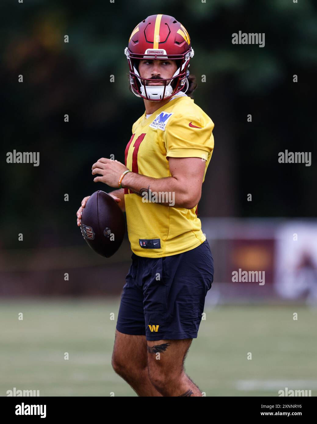 Washington Commanders quarterback Sam Hartman (11) warming up before ...
