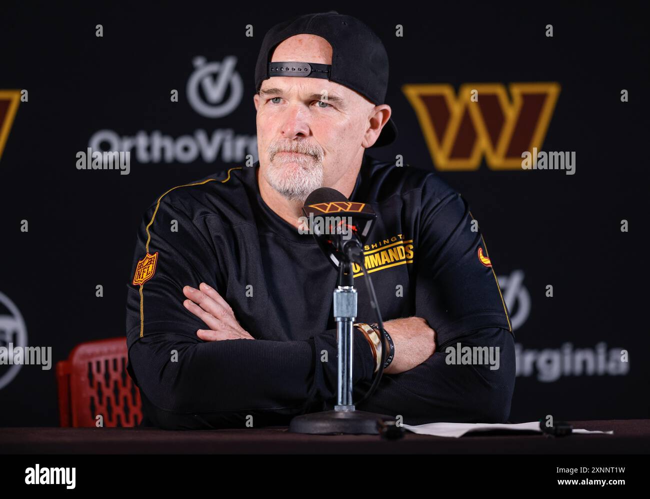 Washington Commanders head coach Dan Quinn addressing the media before ...