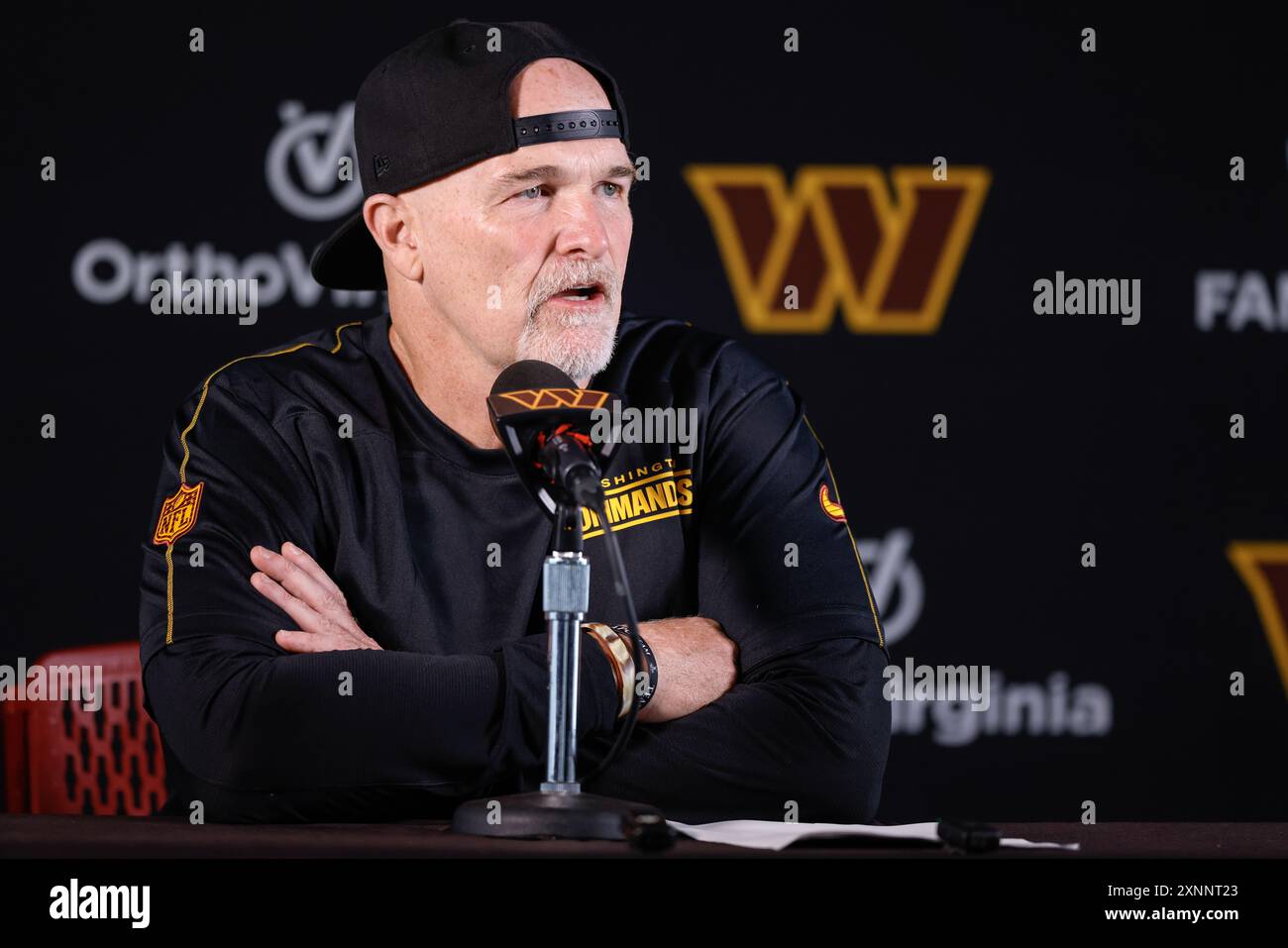 Washington Commanders head coach Dan Quinn addressing the media before ...