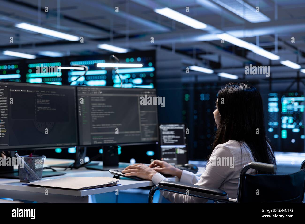 Person with paraplegia working in inclusive server farm facility, doing ...