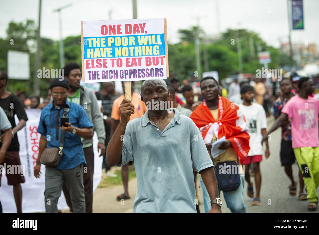 LAGOS, NIGERIA - AUGUST 1: A protester displaying his placard while ...
