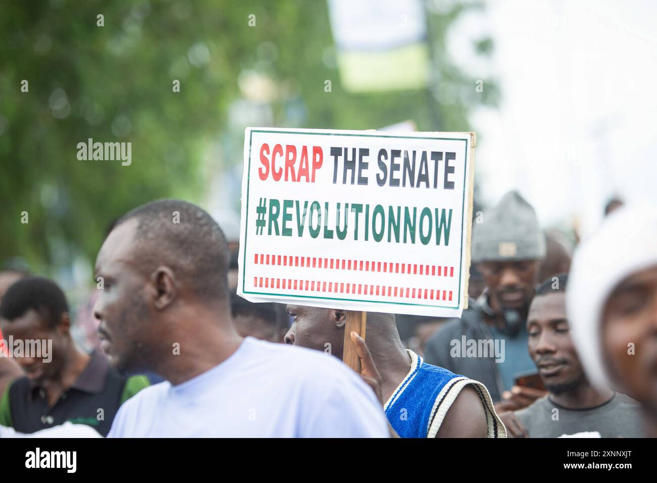 LAGOS, NIGERIA - AUGUST 1: A protester displaying his placard at the ...