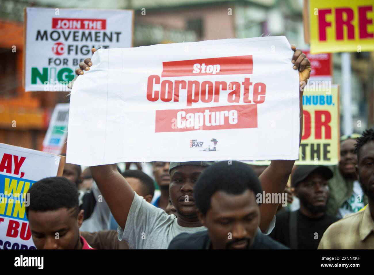 LAGOS, NIGERIA - AUGUST 1: A protester displaying his placard while ...