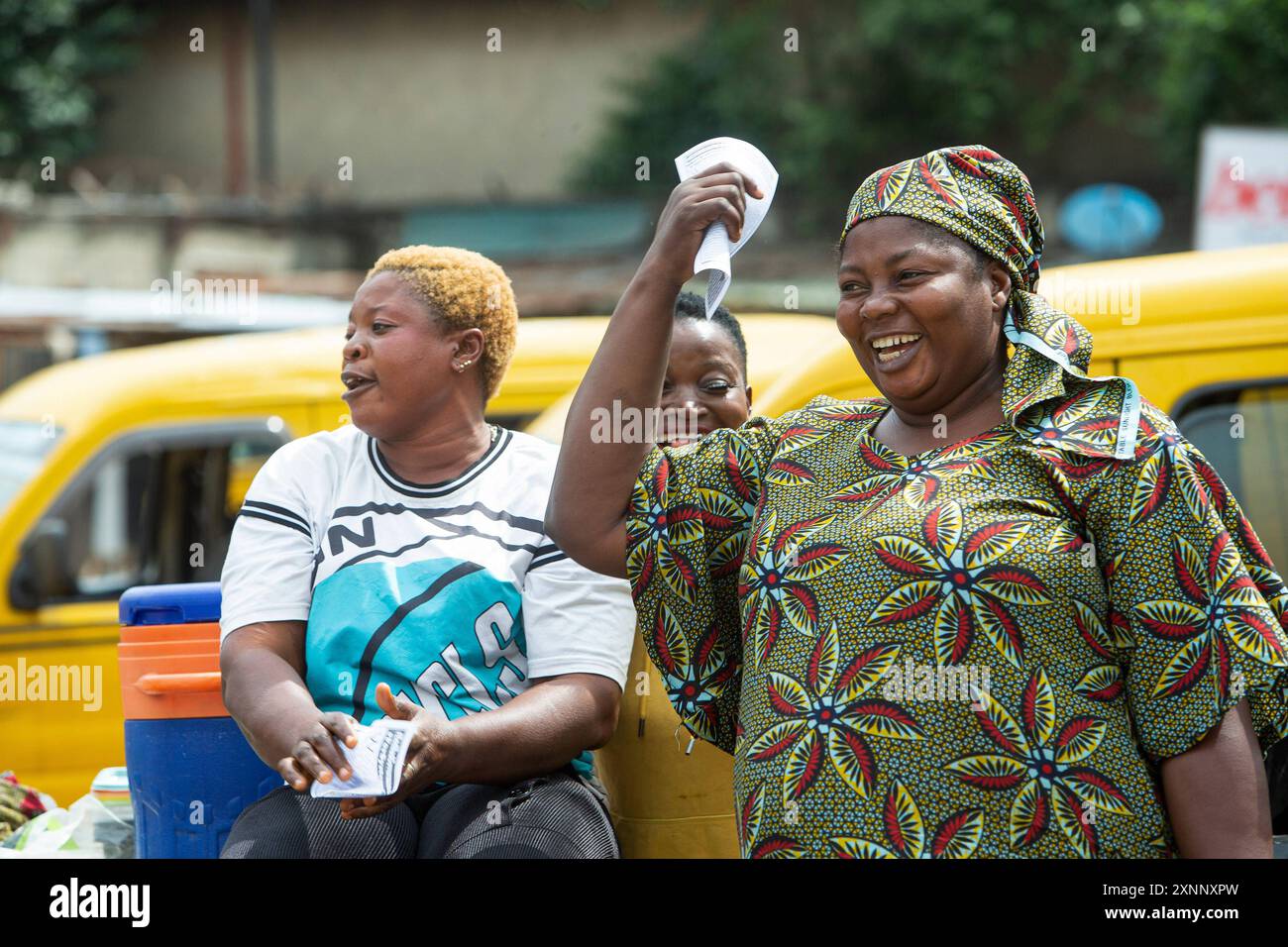 LAGOS, NIGERIA - AUGUST 1: Onlookers, cheering protesters on during ...