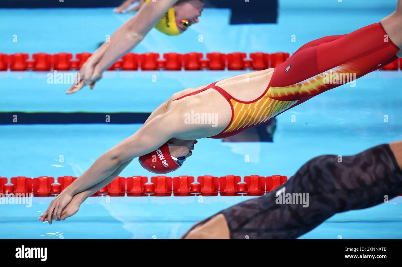 Paris, France. 1st Aug, 2024. Yang Junxuan of China dives into the pool ...