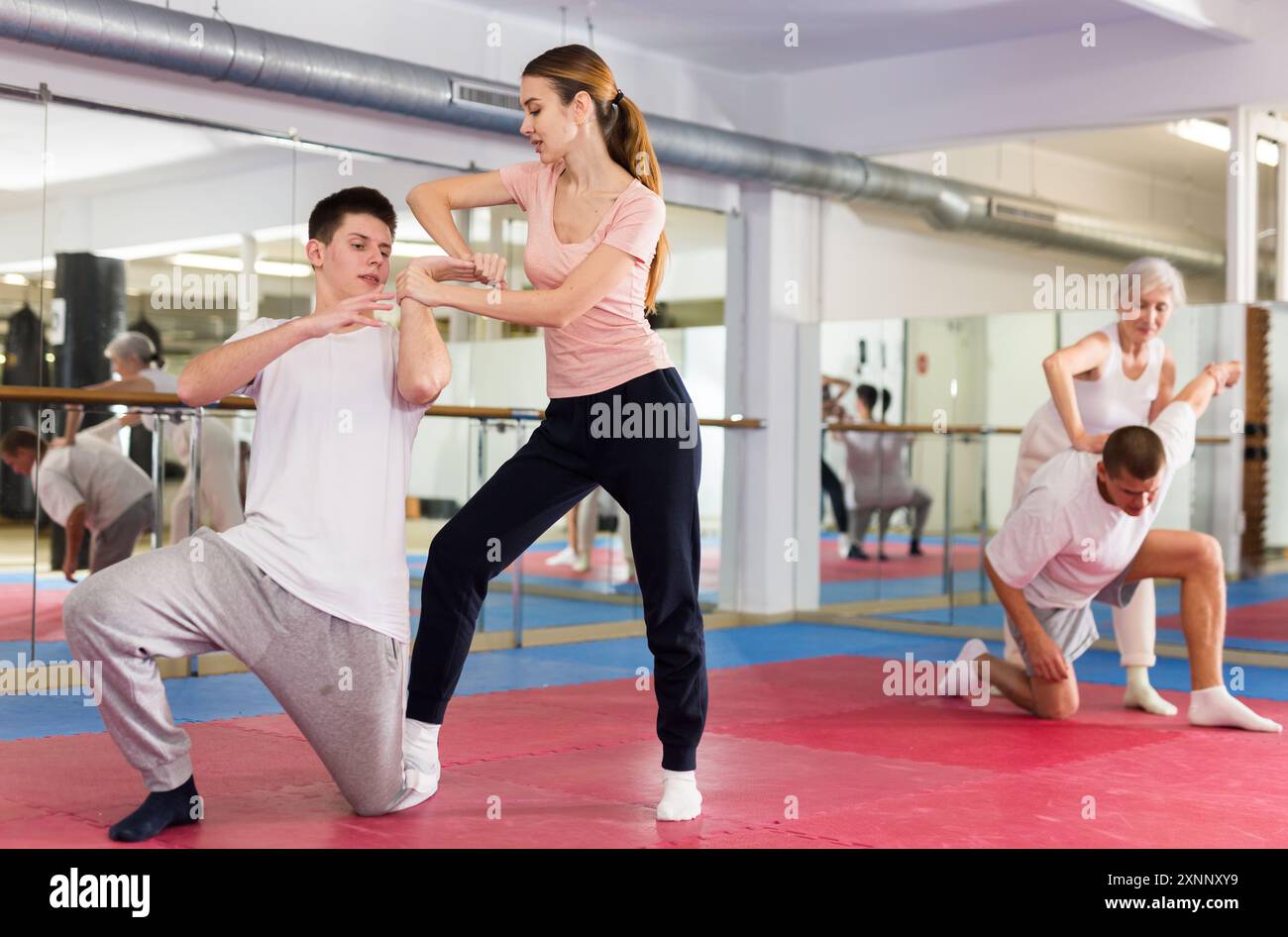 Woman performing elbow strike during self-defence training Stock Photo ...
