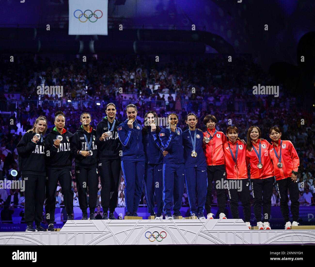 Paris, France. 1st Aug, 2024. Gold medalists team USA (C), silver medalists team Italy and ...