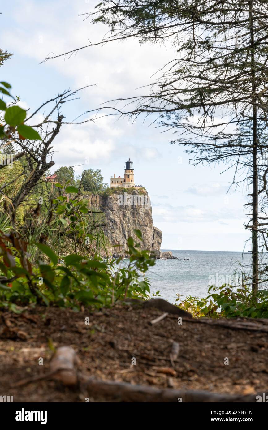 A beautiful view of Split Rock Lighthouse on the rocky coast of Lake ...