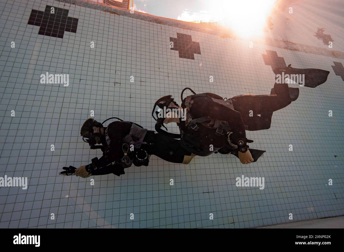 West Coast-based Naval Special Warfare (NSW) operators conduct dive ...
