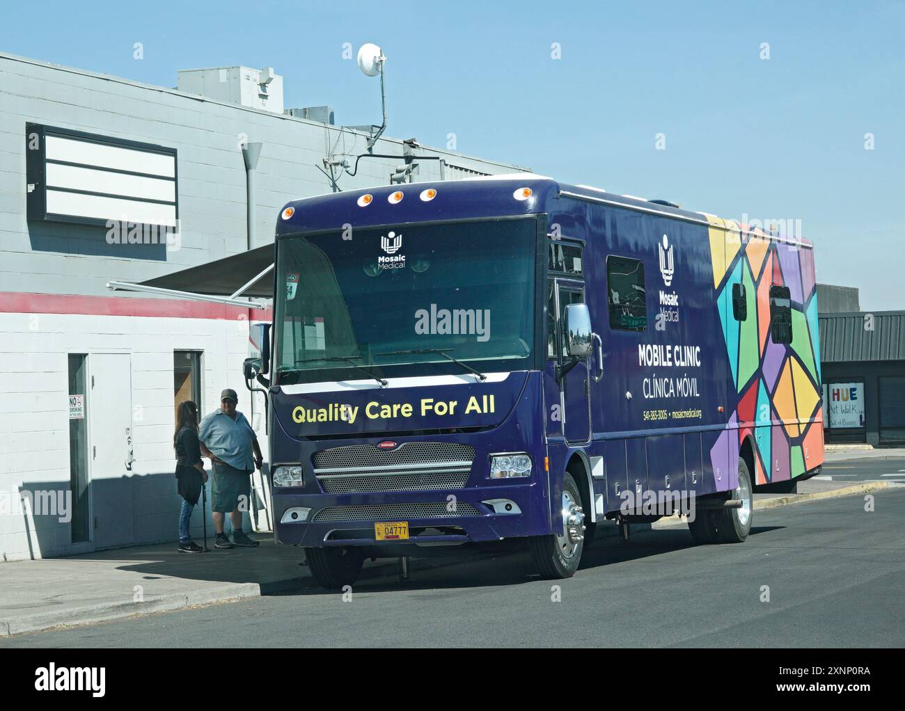 A mobile medical bus parked on a side street in downtown Bend, Oregon ...