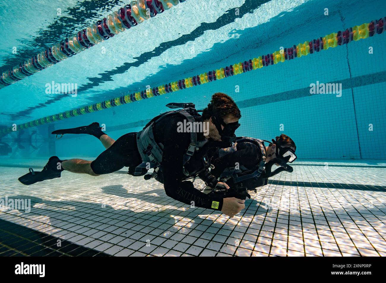 West Coast-based Naval Special Warfare (NSW)operators conduct dive ...